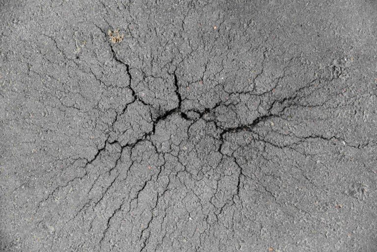 Asphalt Overlay vs. Full Replacement: Pros and Cons Asphalt Overlay vs. Full Replacement: Pros and Cons